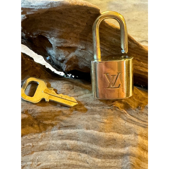 Louis Vuitton | Bags | Louis Vuitton Gold Lock And Key 32 Authentic ...